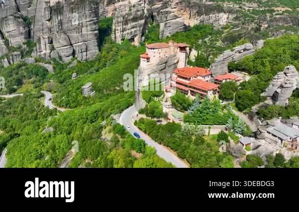 Aerial drone flight towards the Roussanou Monastery (St. Barbara) in ...