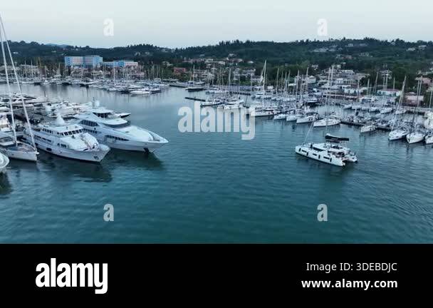 Aerial drone view of luxury marina with superyachts and catamaran ...