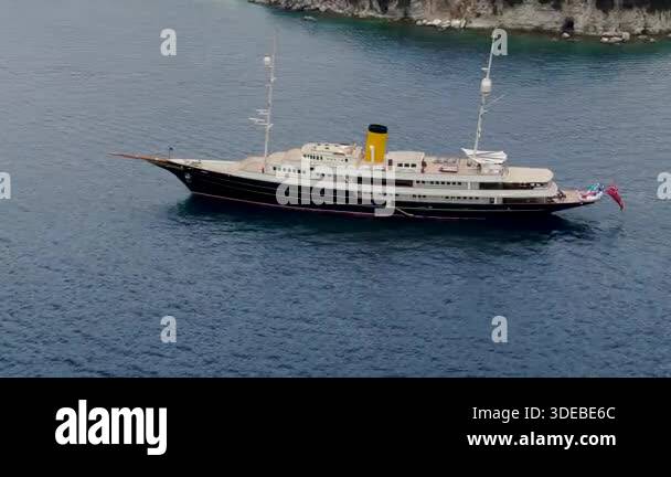 Aerial View of a Classic Black and Cream Luxury Superyacht Anchored in ...