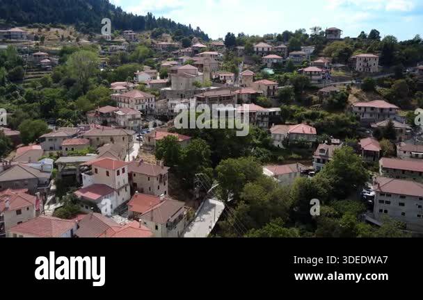 Aerial drone footage showing an ancient, traditional Balkan mountain ...
