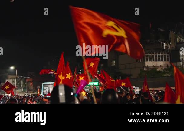Large crowd of vietnamese fans celebrating a football victory on a city ...