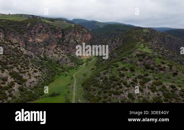Aerial view of pathway leading to valley Stock Video Footage - Alamy