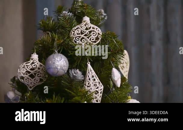 Christmas ornaments with Christmas tree toys shine on pine branches ...