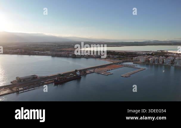 Aerial view of Torrevieja port in Spain showing harbor piers a cargo ...
