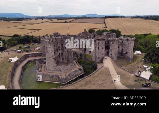 Raglan, Monmouthshire, Wales, UK - 23 August 2025: Aerial view circling ...