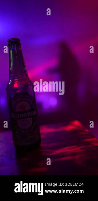 Rome, italy 2 january 2026: heineken beer bottle sitting on a table in ...