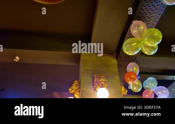 An upward-looking view of a decorative ceiling with colorful ...