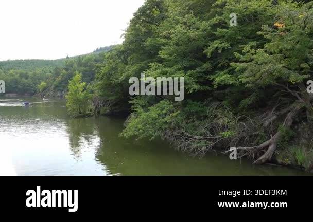 Brno, Czech Republic - August 16, 2025 - Brno Dam - Boating on a calm ...