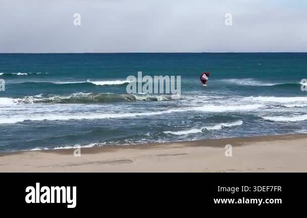 Wind Foiling at Estartit beach in catalonia spain Stock Video Footage ...
