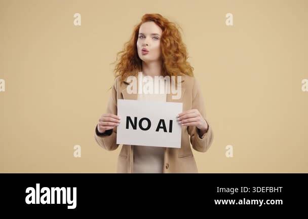 Serious corporate woman standing on beige wall, holding handmade sign ...