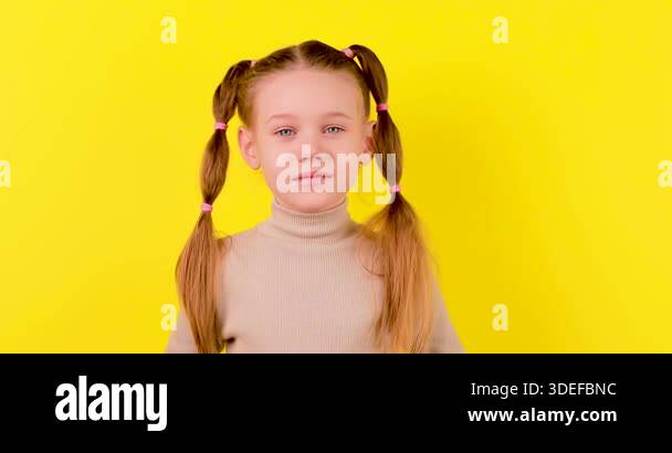 4K footage of a Caucasian girl sniffing and reacting to a smell against ...