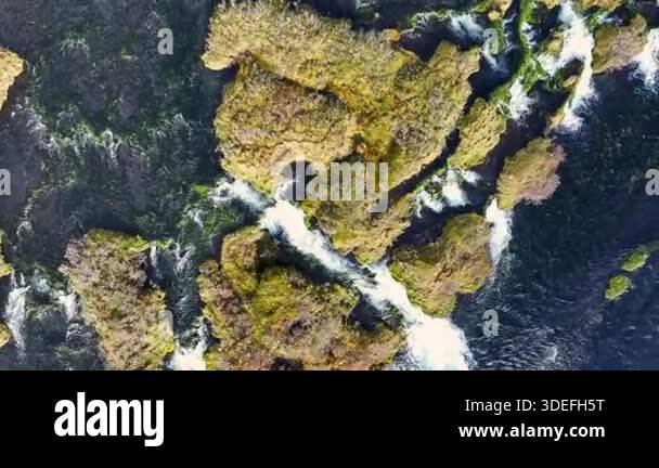 Aerial view around the Fossabrekkur falls - Burfell Mountain - Iceland ...