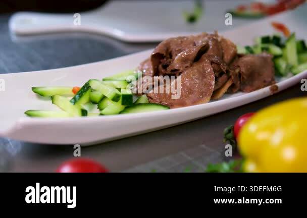 Marinated tongue with sesame seeds, cucumber, and paprika, deliciously ...