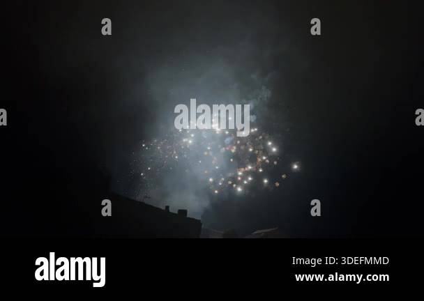 Colorful fireworks display illuminating the city skyline during a ...