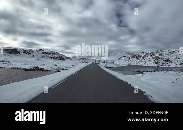 Point of view shot driving on the scenic Sognefjellsvegen road through ...