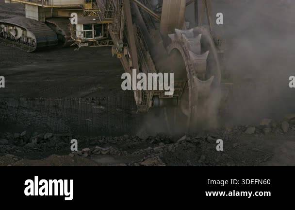 A large bucket wheel excavator in a lignite brown coal mine Stock Video ...
