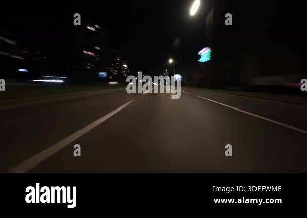 Night city drive hyperlapse with motion blur and light trails, filmed ...