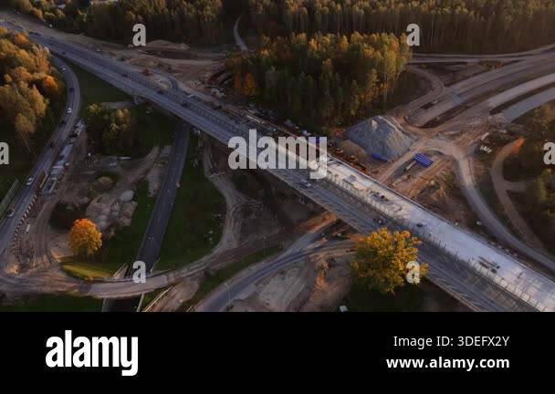 Drone follows diagonal bridge axis as traffic moves and crews work on ...