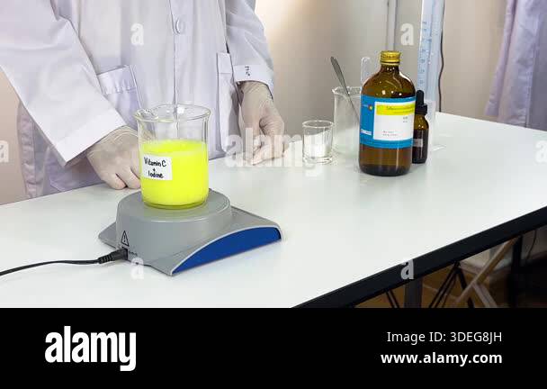 Chemical reaction demonstration with color change Stock Video Footage ...