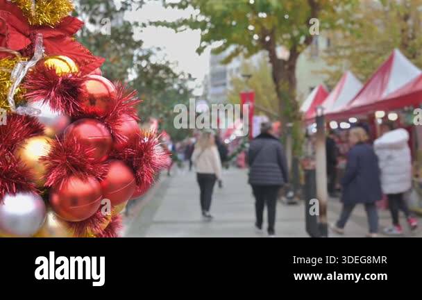 New Year Decorations Outdoors with Golden Baubles and Cheerful Holiday ...