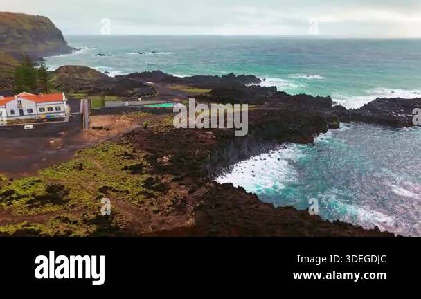 Aerial view of Ponta da Ferraria hot springs and the dramatic Atlantic ...