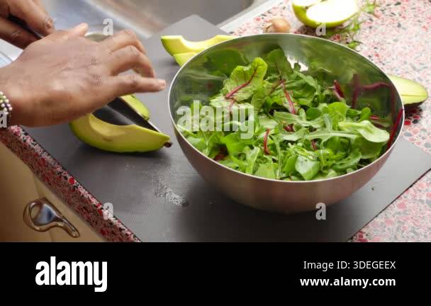 Person making healthy salad at home Stock Video Footage - Alamy