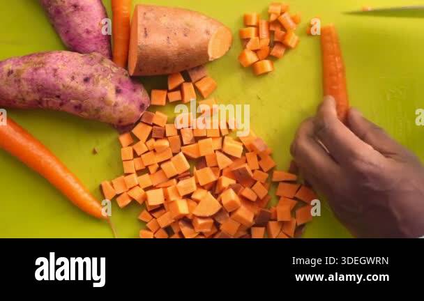 person preparing fresh vegetables on cutting board Stock Video Footage ...