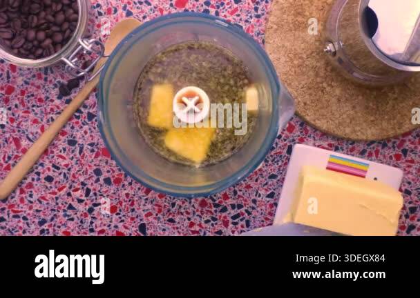person making coffee with butter and MCT oil Stock Video Footage - Alamy