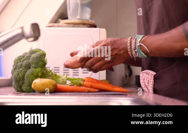 Person preparing organic food in kitchen for healthy meal Stock Video ...