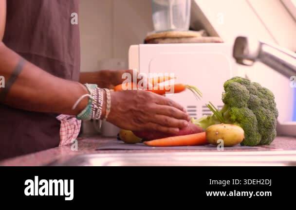 Person preparing organic food in kitchen for healthy meal Stock Video ...