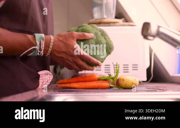 Person preparing organic food in kitchen for healthy meal Stock Video ...