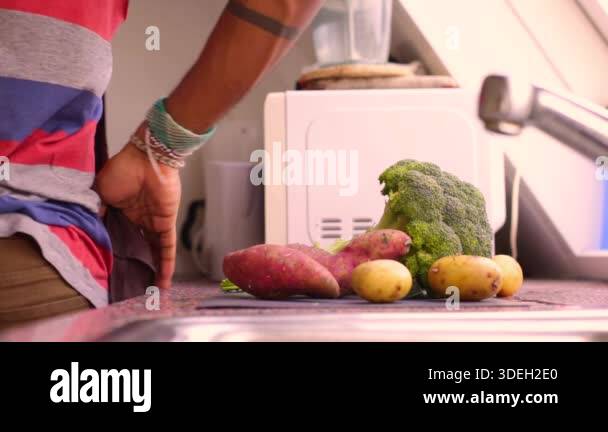 Person preparing organic food in kitchen for healthy meal Stock Video ...