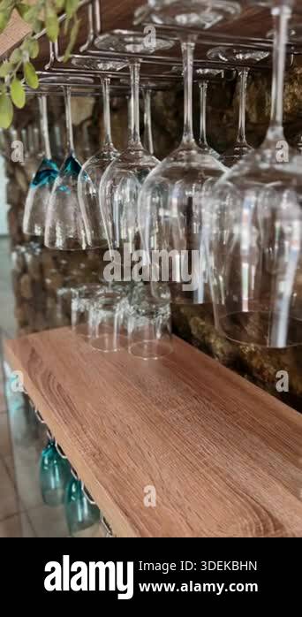 glasses are hanging on the bar counter Stock Video Footage - Alamy