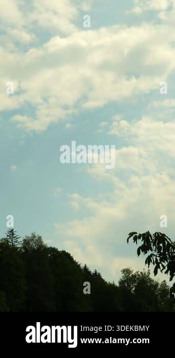 Timelapse of clear sky with white fluffy clouds. Beautiful nature ...