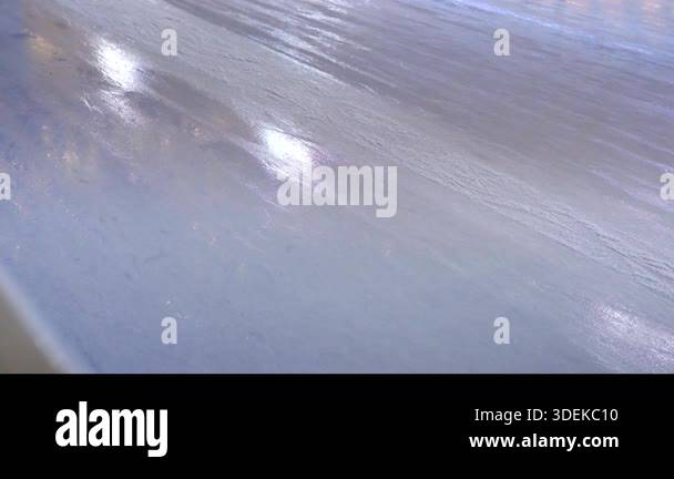 Glossy cool blue abstract background with bright light reflections and ...