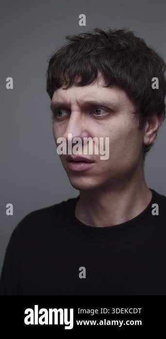 Hidden dislike behind polite smile. Man shows subtle disgust then ...