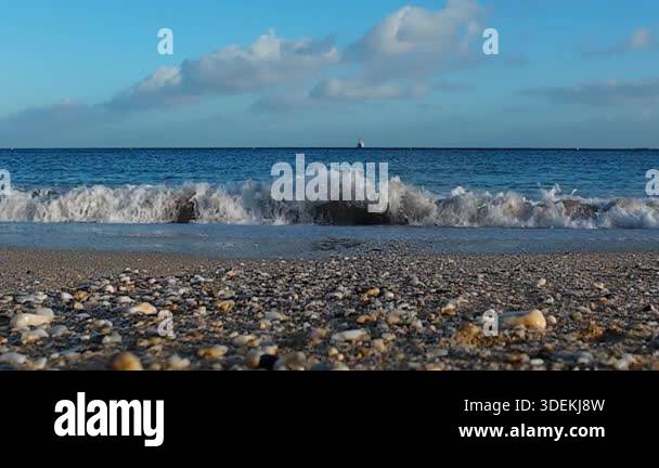 Beautiful waves forming energy and foam coastal scene. High quality 4k ...