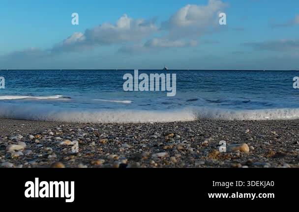 Beautiful waves forming energy and foam coastal scene. High quality 4k ...