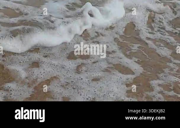 Beautiful waves forming energy and foam coastal scene. High quality 4k ...