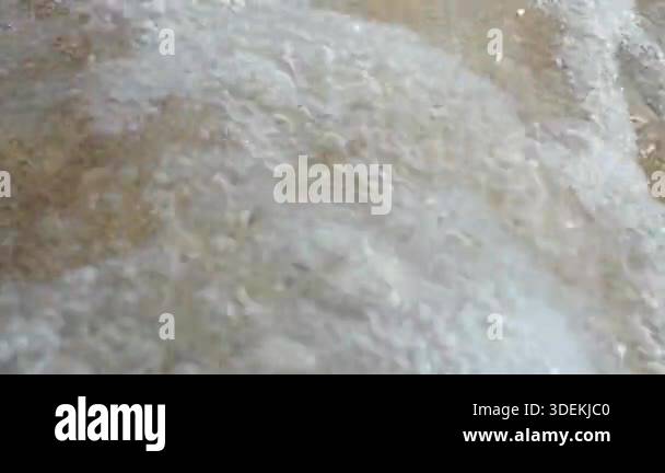 Beautiful waves forming energy and foam coastal scene. High quality 4k ...