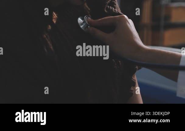 Doctor using a stethoscope checking patient with examining, presenting ...