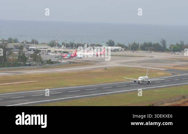PHUKET, THAILAND - FEBRUARY 25, 2025: Footage of plane Thai AirAsia ...
