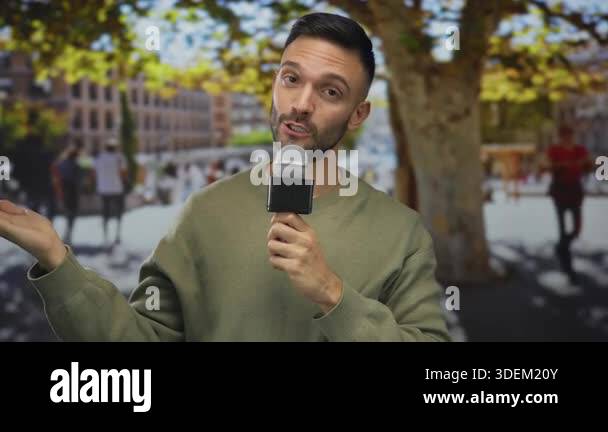 Young hispanic man holding microphone conducting street interview in ...