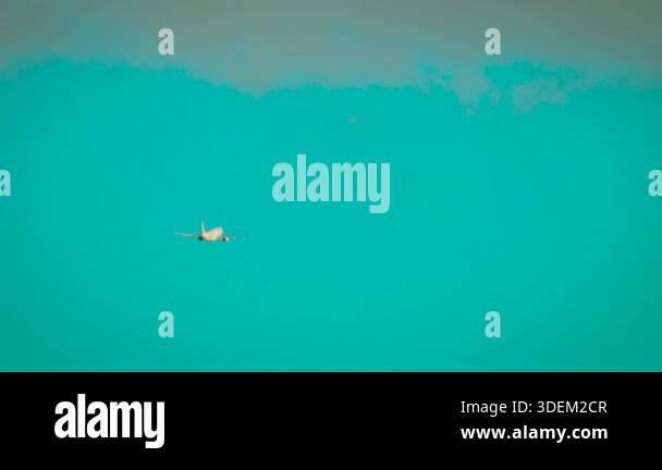 Pilot gaining altitude after takeoff flying into blue sky. Aviator ...