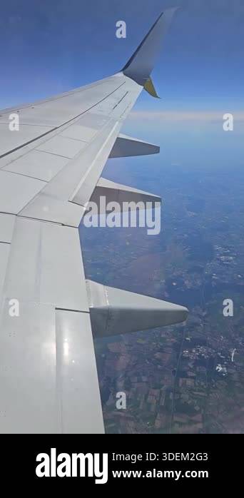 Airplane flying above mixed farmland and small towns. Aeroplane ...