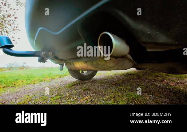 Faulty engine producing white smoke and water spray from exhaust pipe ...