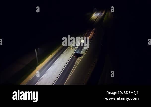 Van delivering goods at night, headlights lighting road. Cargo vehicle ...