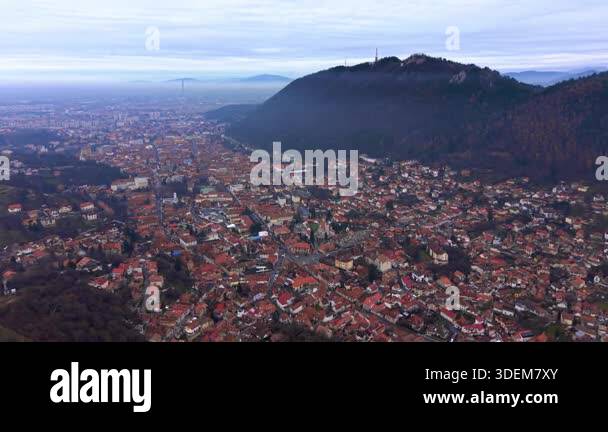 Aerial drone footage showing the city of Brasov in Transylvania ...