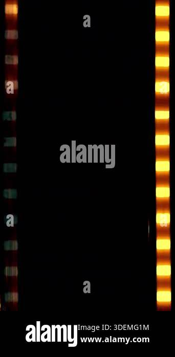 Vertical Grunge Film Strip Background with Beautiful Warm Glow Effects ...