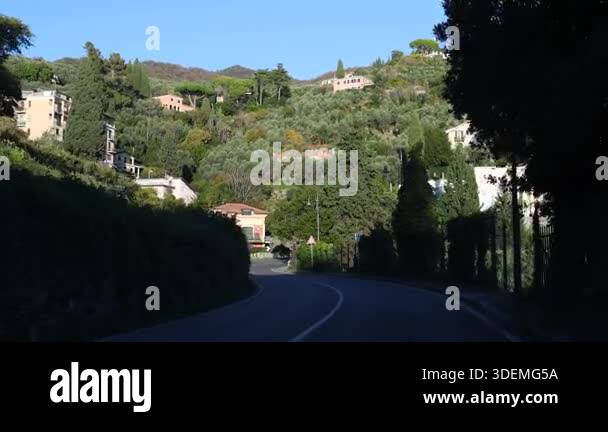 Mountain road, nature, olive trees, buildings in Liguria, Italy. Sunny ...